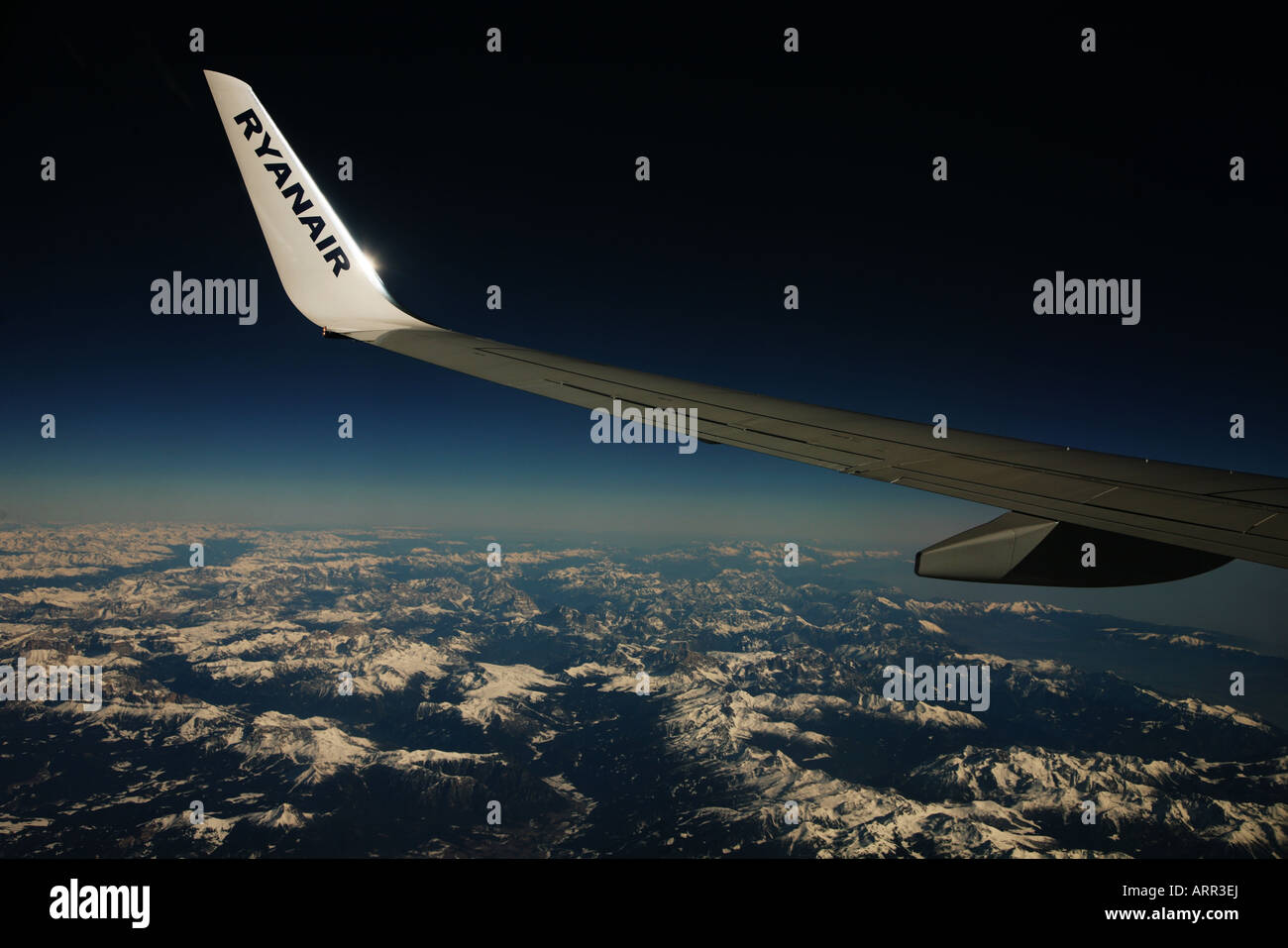 ryanair airplane sky panoramic mountains alps blue Stock Photo - Alamy