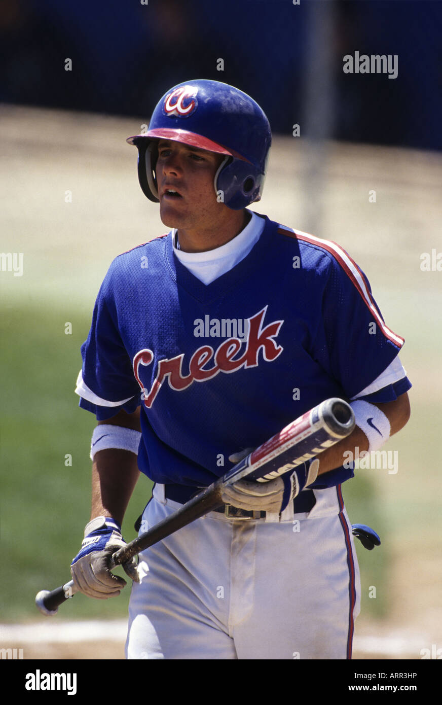 Baseball player in action batting Stock Photo - Alamy