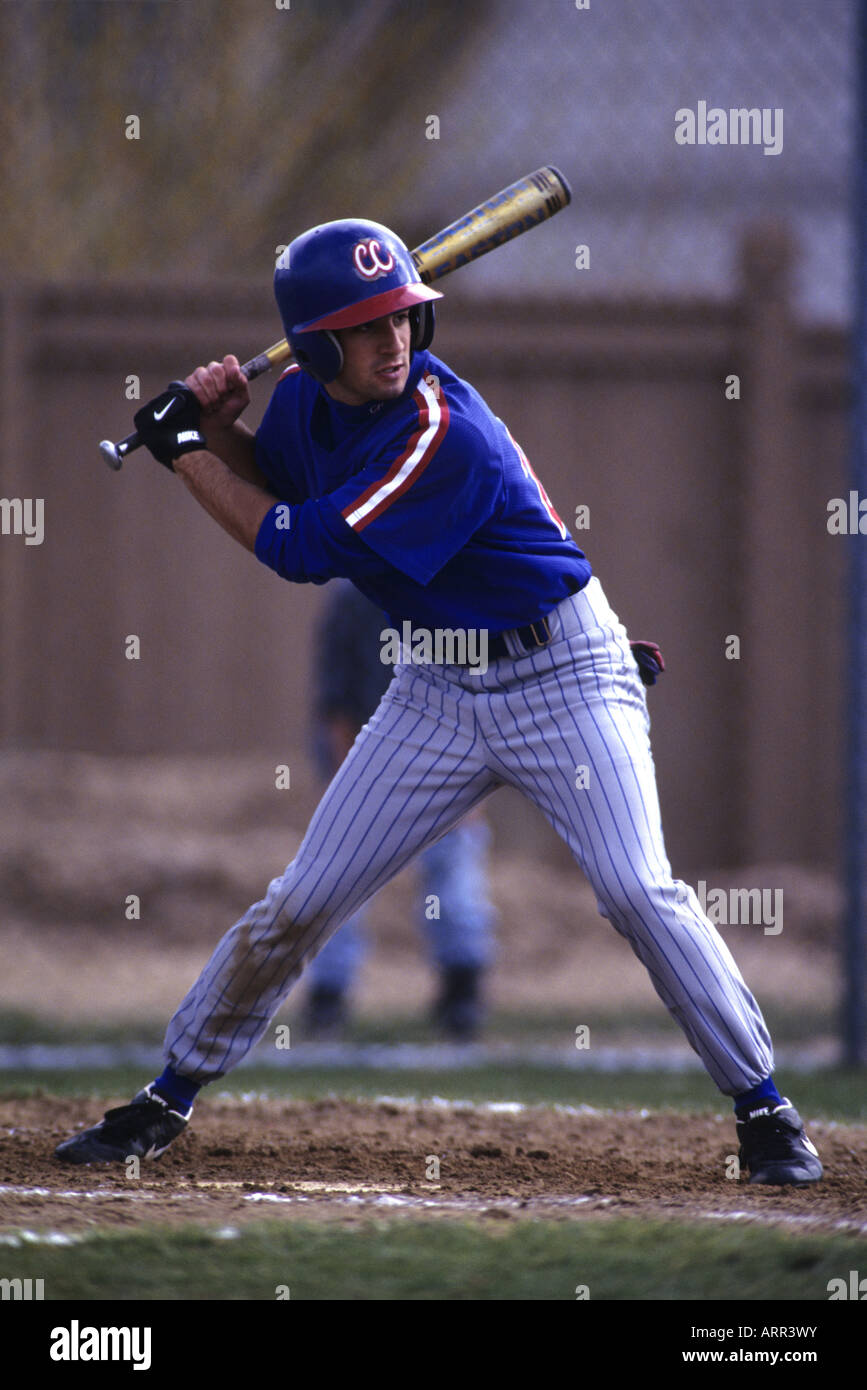Baseball player in action batting Stock Photo - Alamy