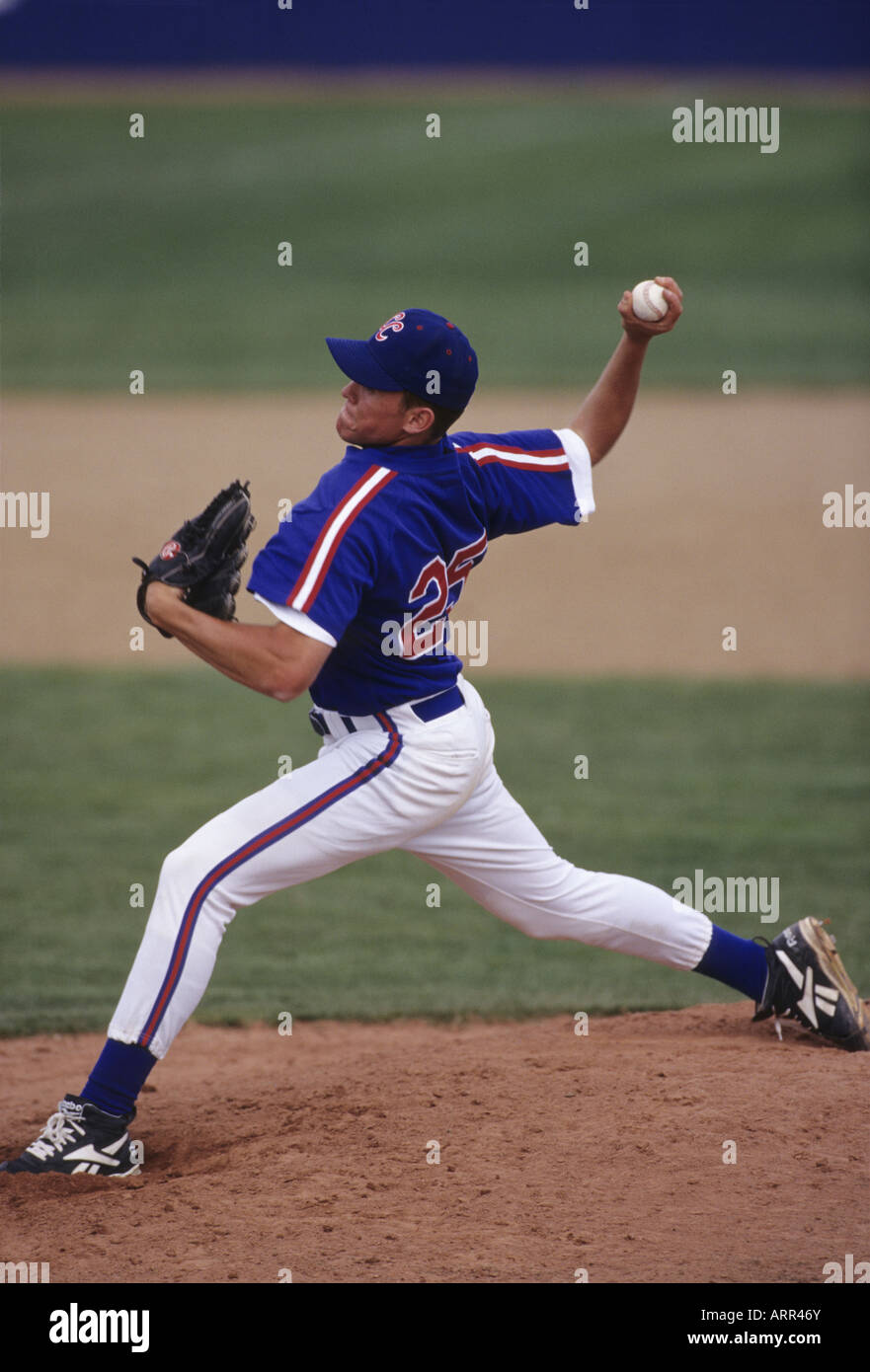 Baseball pitcher in action Stock Photo - Alamy