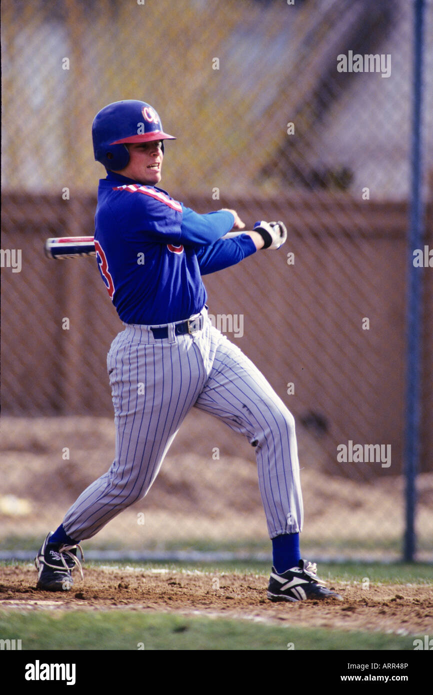 Baseball player in action batting Stock Photo - Alamy