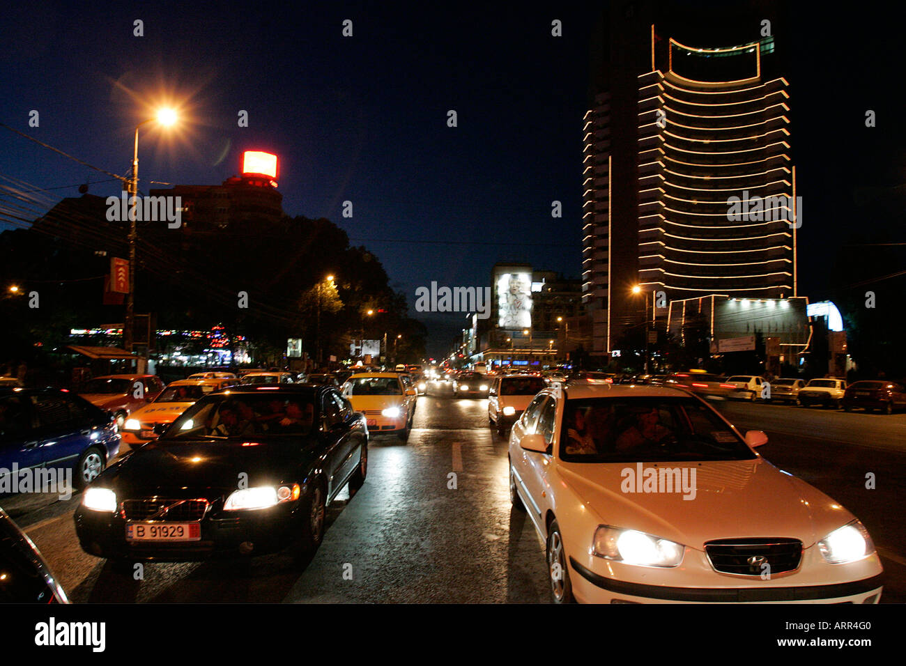 Romania Bucharest night traffic Bucurest Bucuresti town city cityscape ...