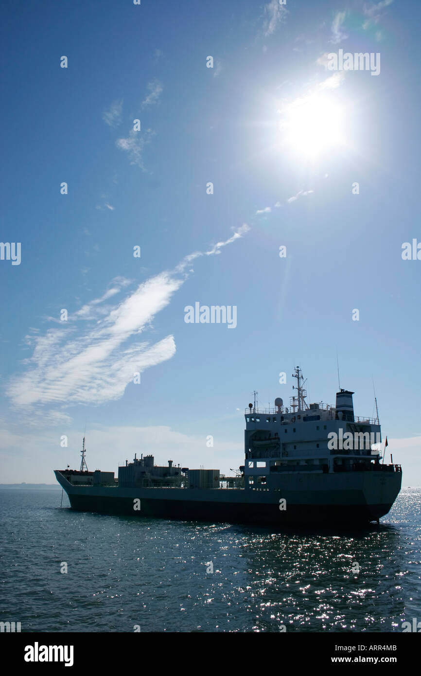 Shipping cargo oil and transport boat in sea with morning fog Stock ...