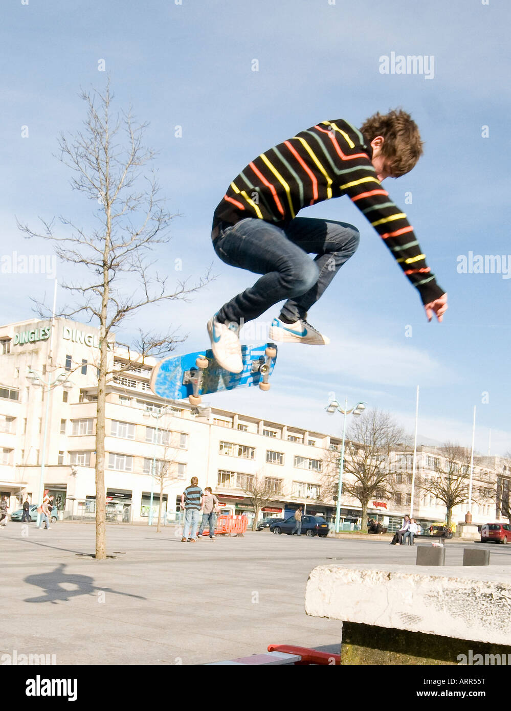 skateboarder leaps off a wall Stock Photo - Alamy