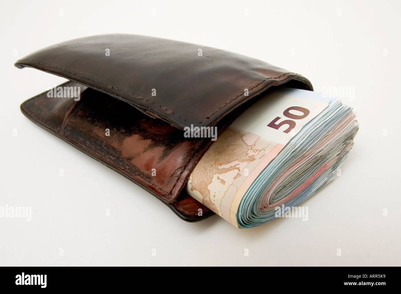 wallet full of cash ready for some investment Stock Photo - Alamy