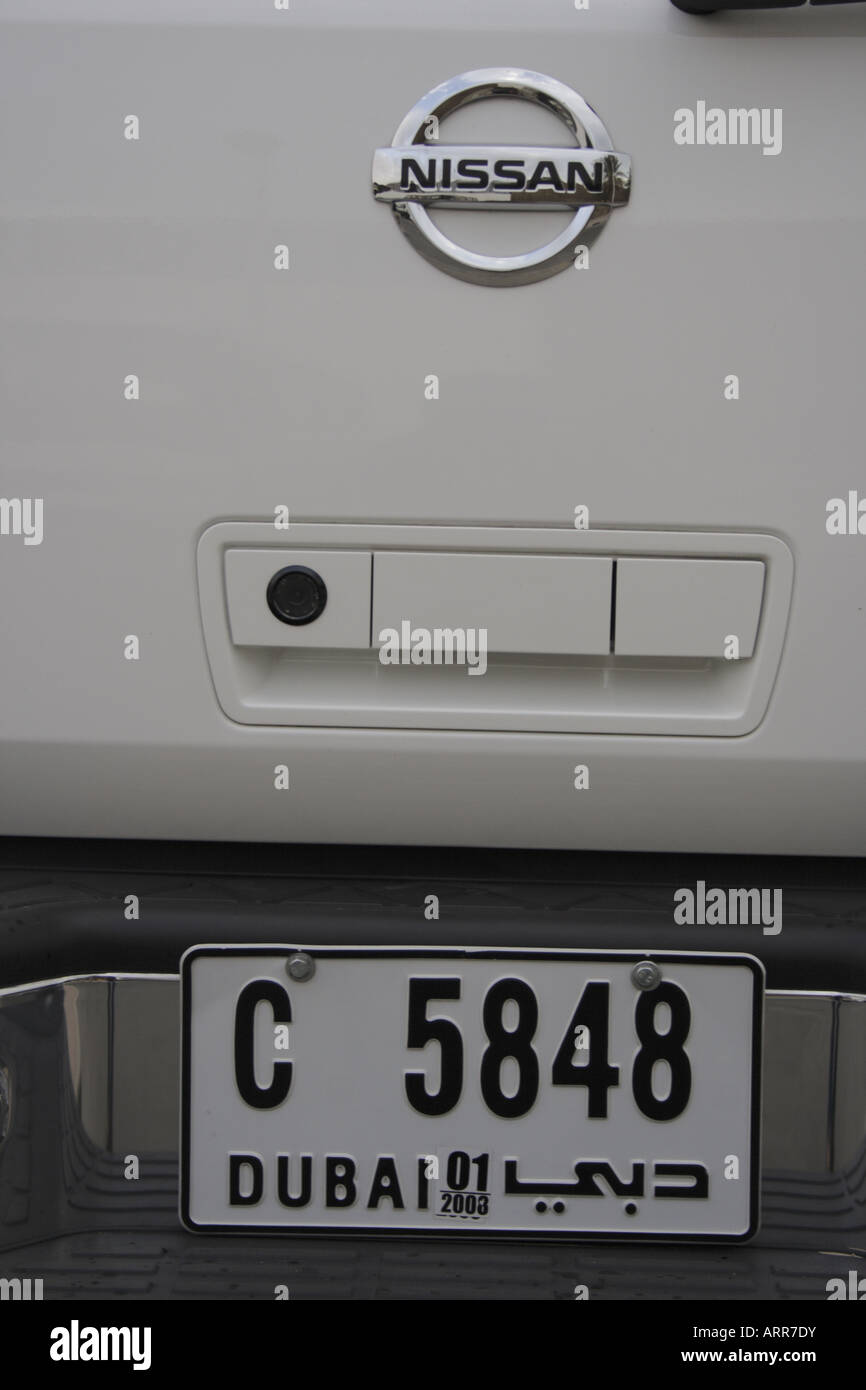 car license plate of a NISSAN car in Dubai, United Arab Emirates. Photo ...