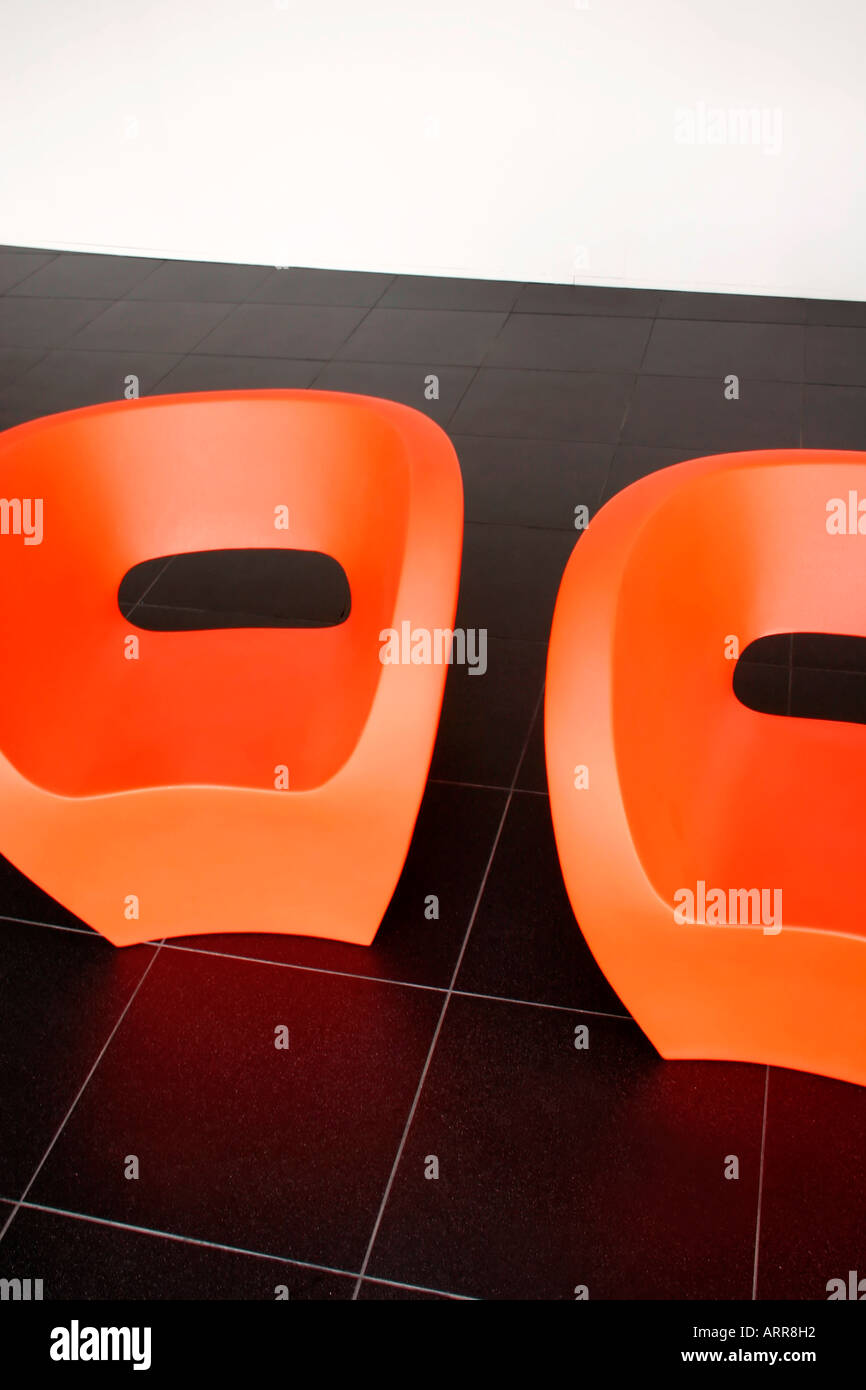 two modern red chairs with great design Stock Photo - Alamy