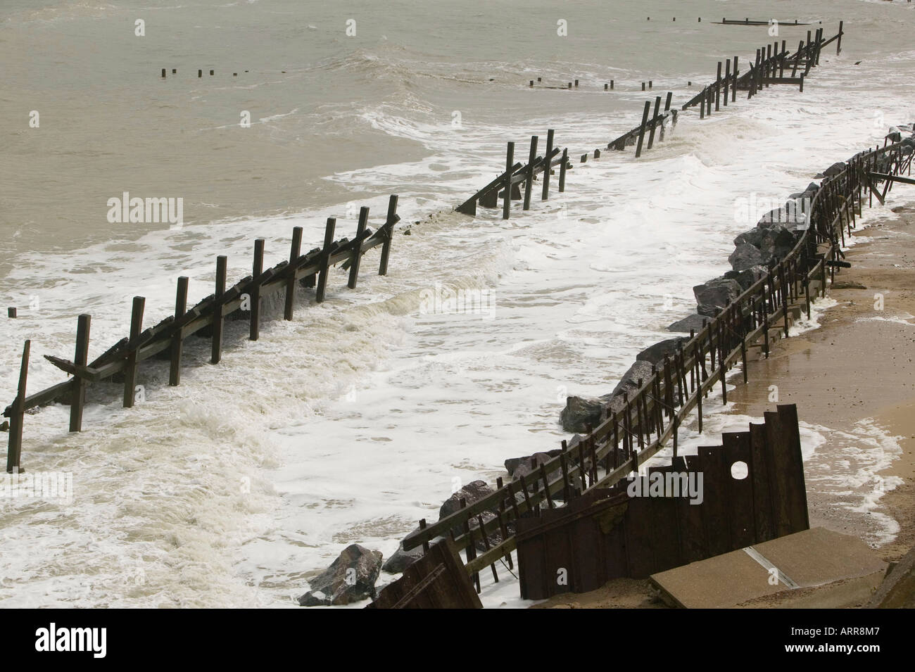 storm waves breaching the sea defences at Happisburgh, Norfolk, UK ...