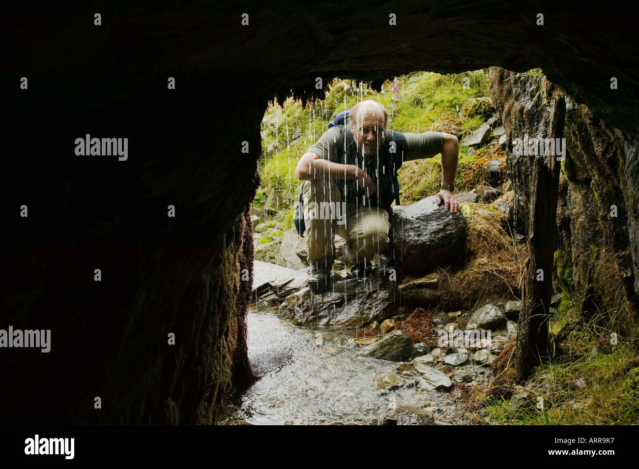 exploring a level in the old Coniston Copper mines, Coniston, Lake ...