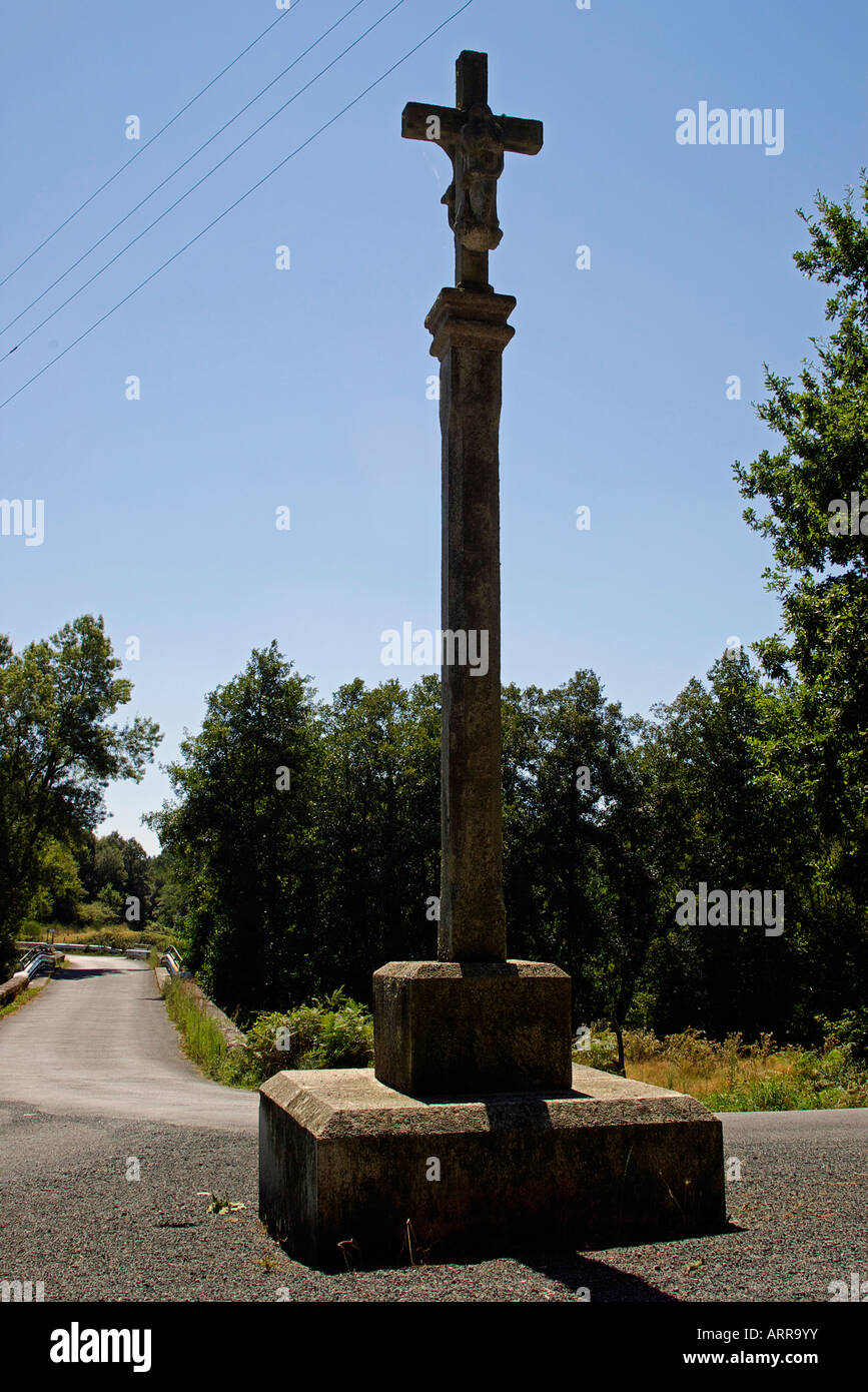 stone cross on a platform with steps and sculpted the crucifix that is ...