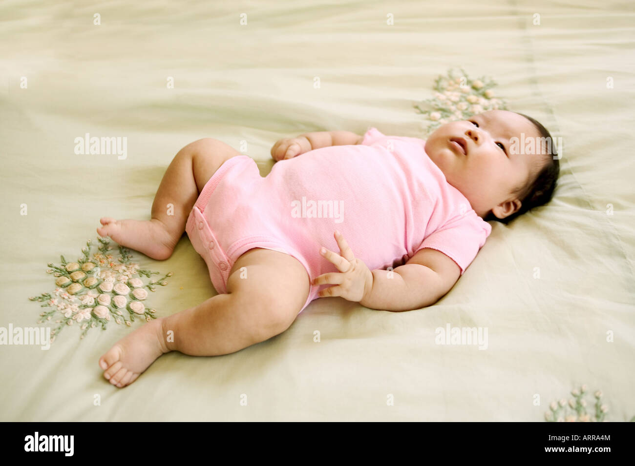 Baby in Pink Stock Photo - Alamy
