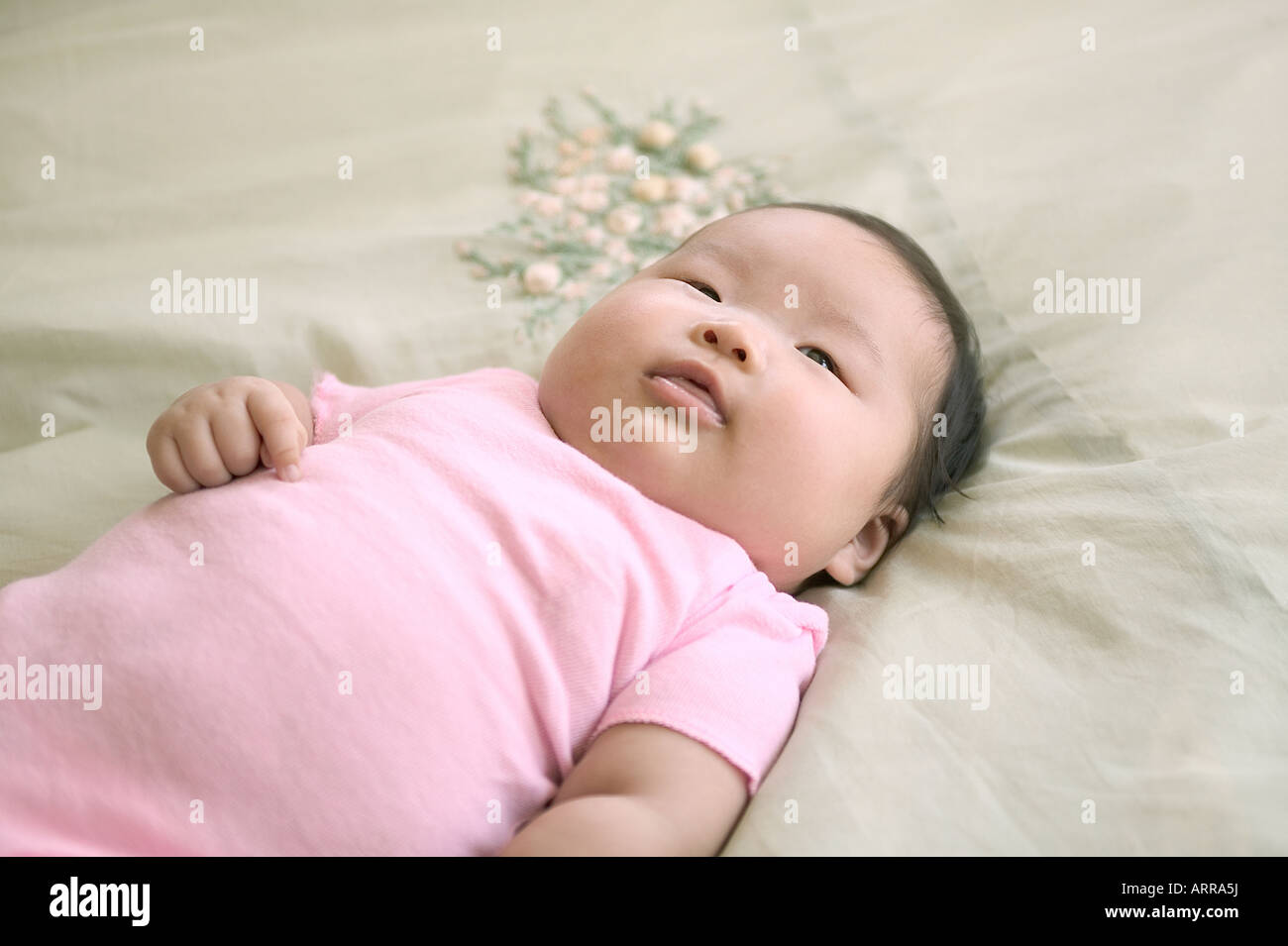 Baby in Pink Stock Photo - Alamy