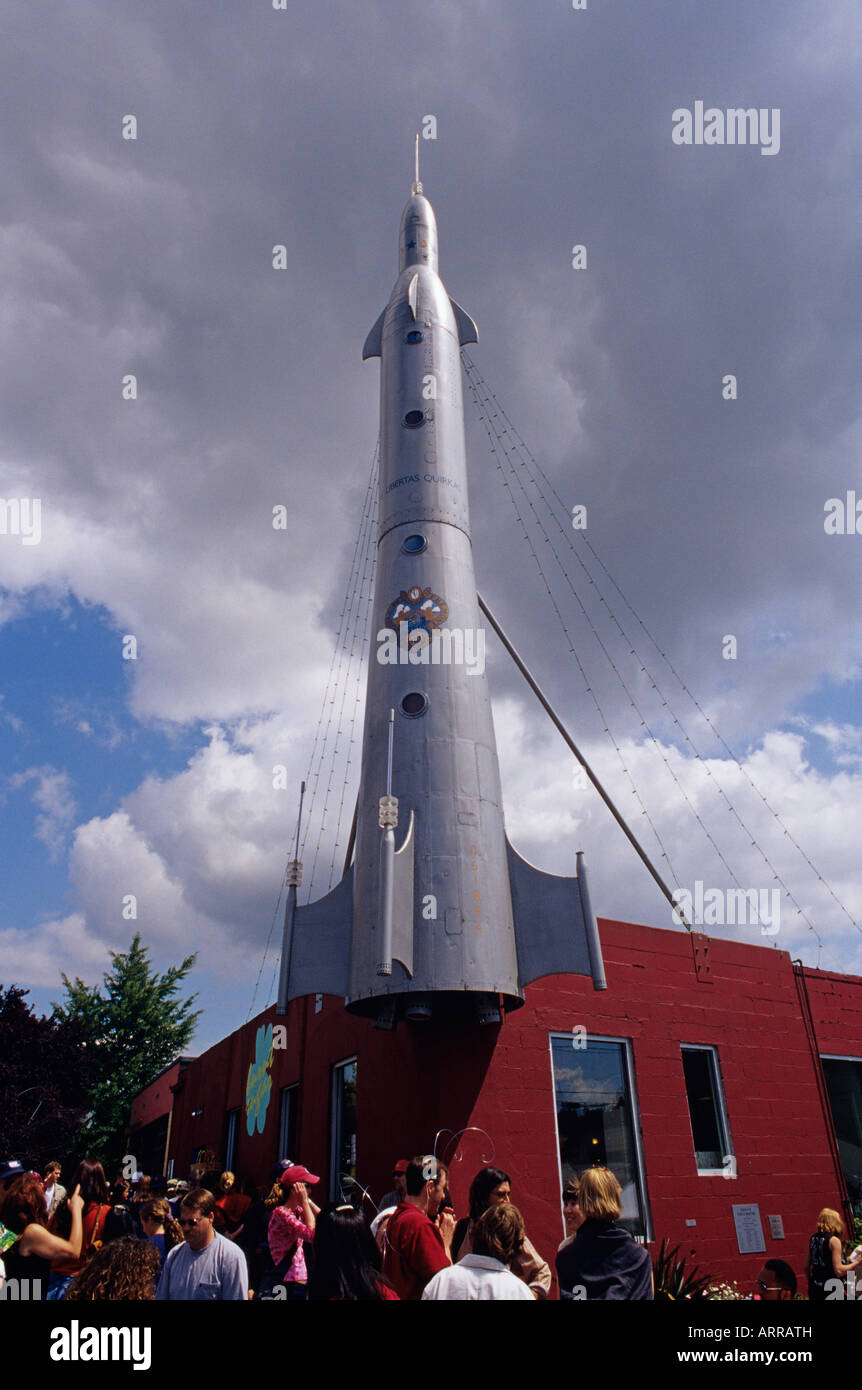 Summer Solstice fair rocket on building humor people enjoying a sunny ...