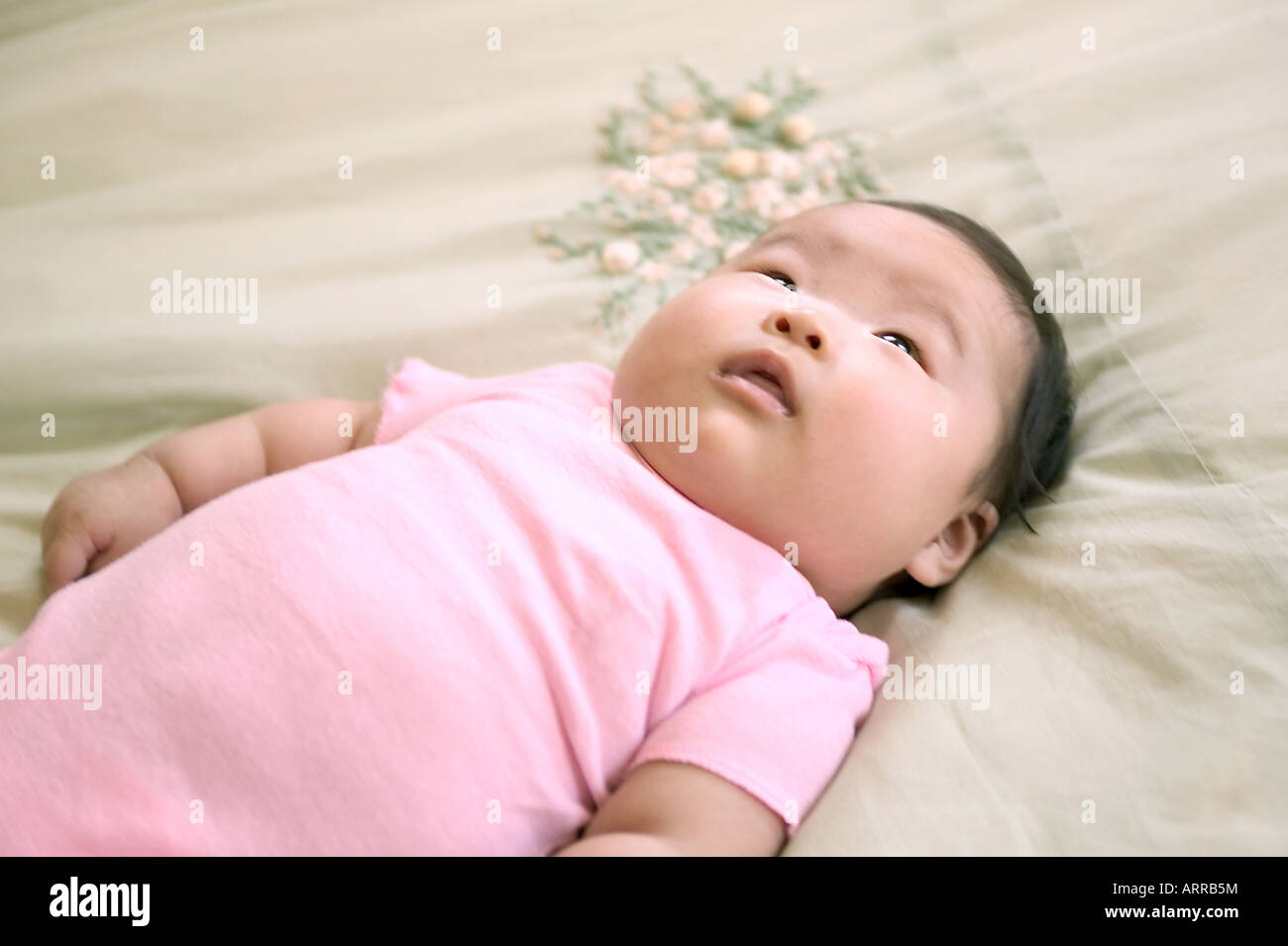 Baby in Pink Stock Photo - Alamy