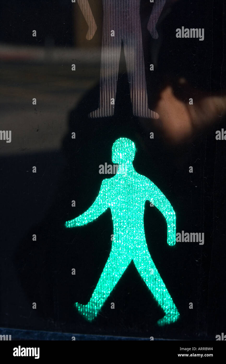 traffic sign green man walking pedestrian crossing Stock Photo - Alamy