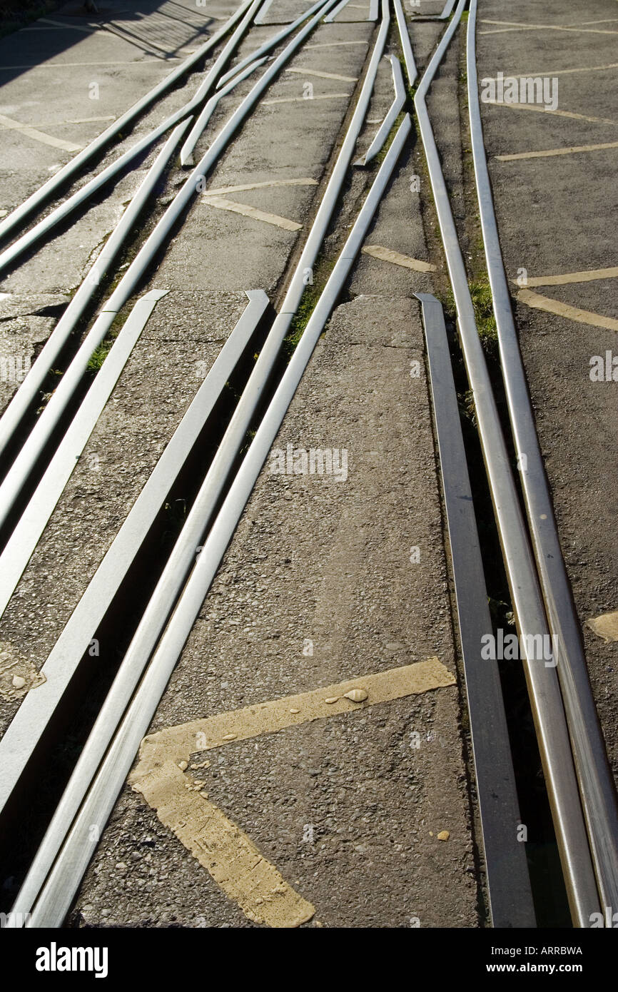 Rail tracks set into road Stock Photo - Alamy