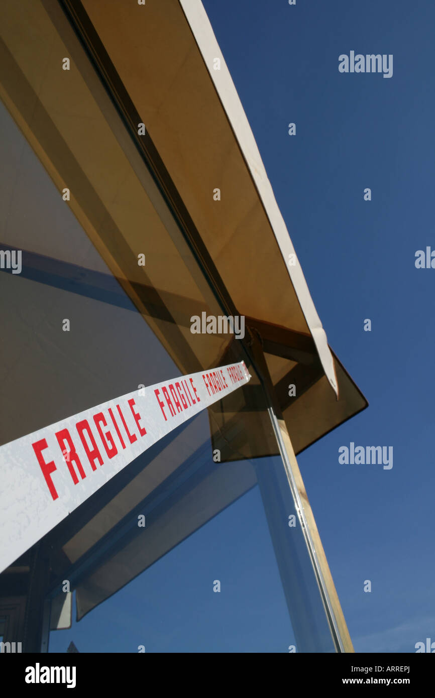 fragile tape on structure Stock Photo - Alamy
