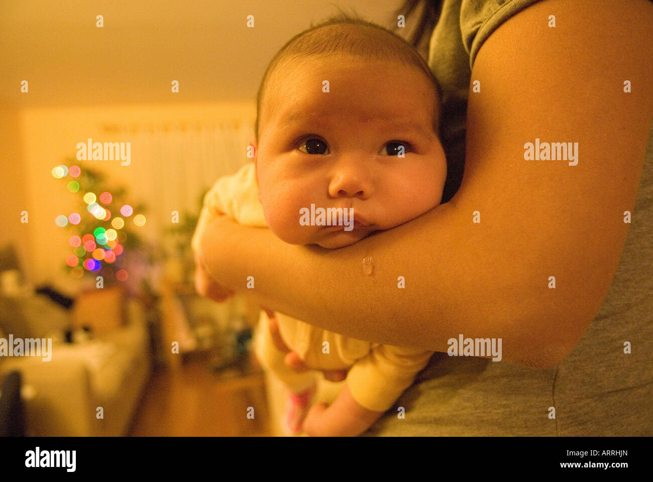 Baby sad face parent hi-res stock photography and images - Alamy