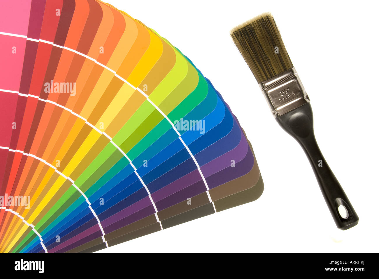 A vibrant fan deck of color cards with a paint brush provides a concept ...