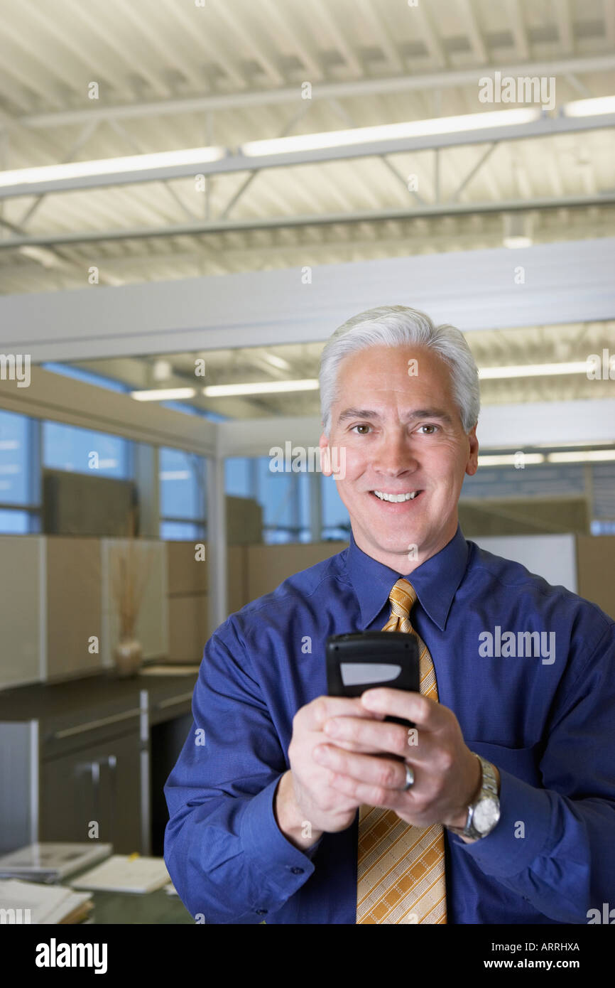 Man with handheld computer Stock Photo - Alamy
