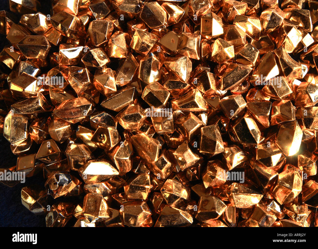 Collection of Gold Coloured Chippings Stock Photo - Alamy