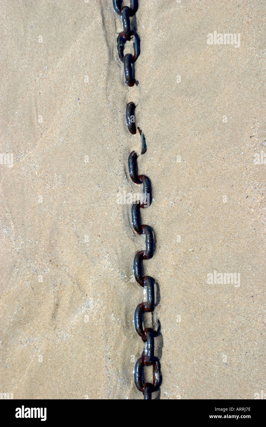 abandoned chains on sand of beach Stock Photo - Alamy