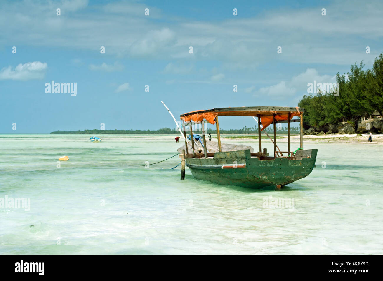 Pongwe Beach with Boat Stock Photo - Alamy