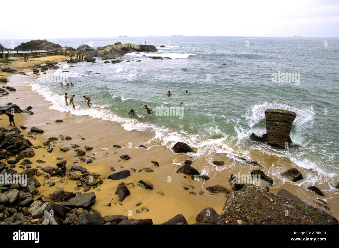 Sri Lanka Colombo Fort District Lighthouse point beach with bathers in ...