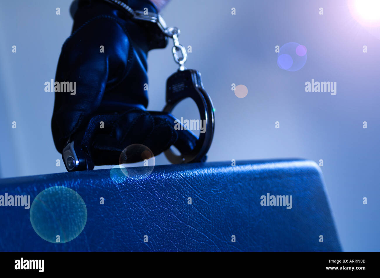 Gloved hand carrying suitcase hi-res stock photography and images - Alamy