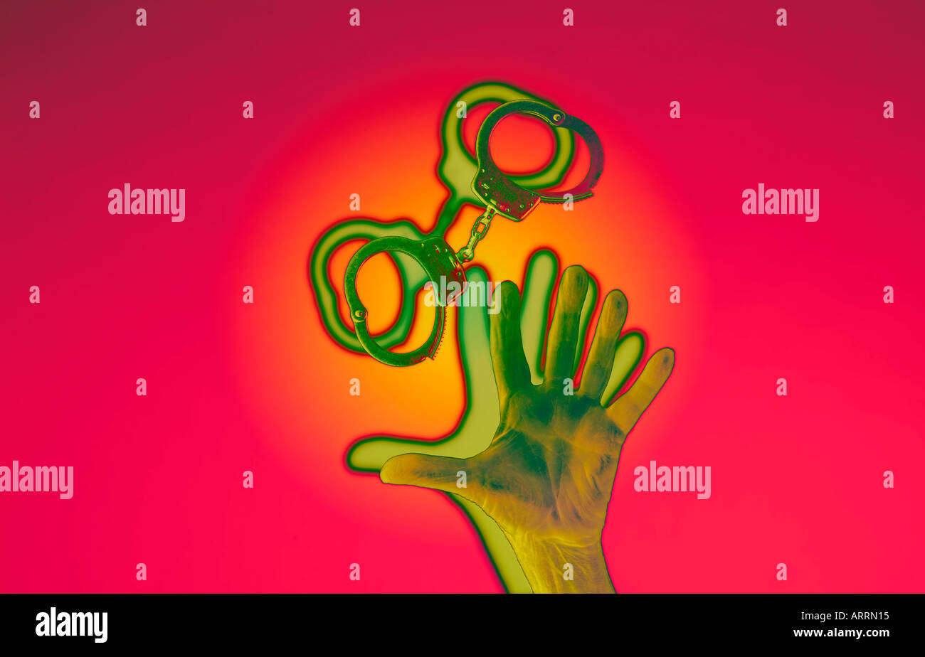hand tossing handcuffs into air Stock Photo - Alamy