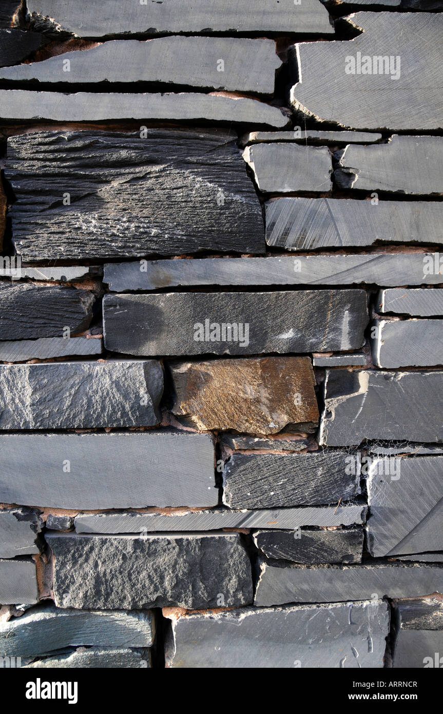 Traditional slate stone wall Stock Photo - Alamy