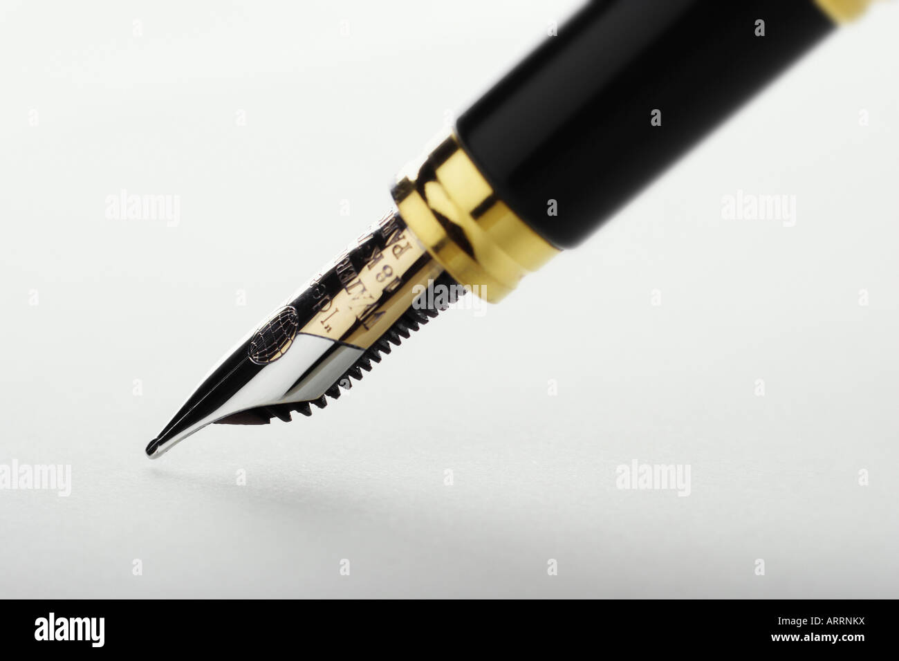 Fountain pen nib on white background Stock Photo - Alamy