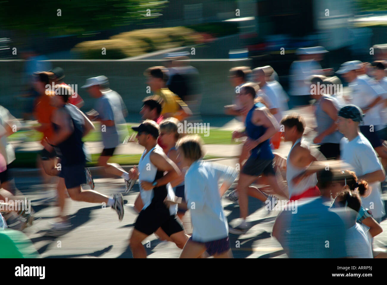 Action photo of runners in American marathon road race Stock Photo - Alamy