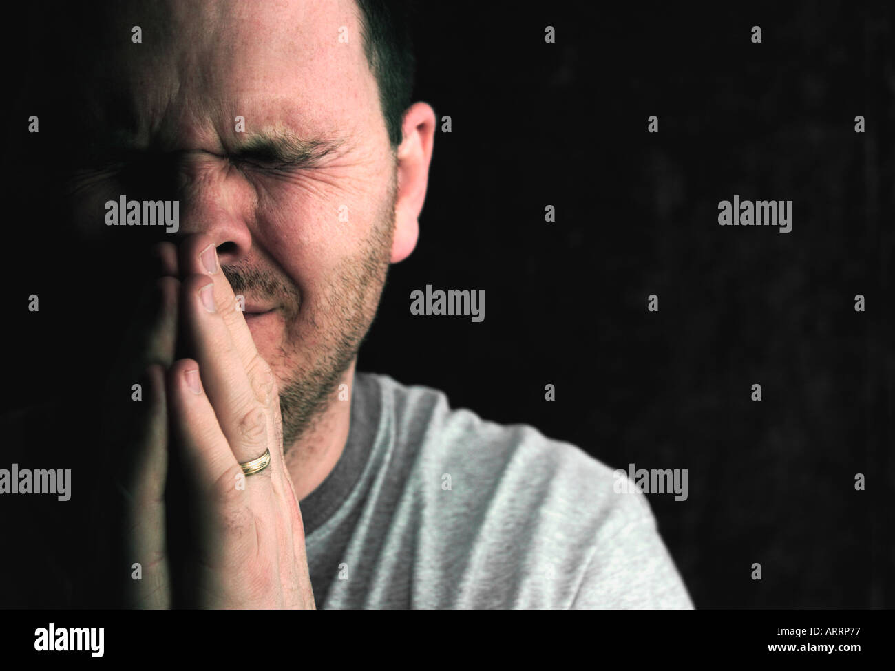 A man contorting his face Stock Photo - Alamy