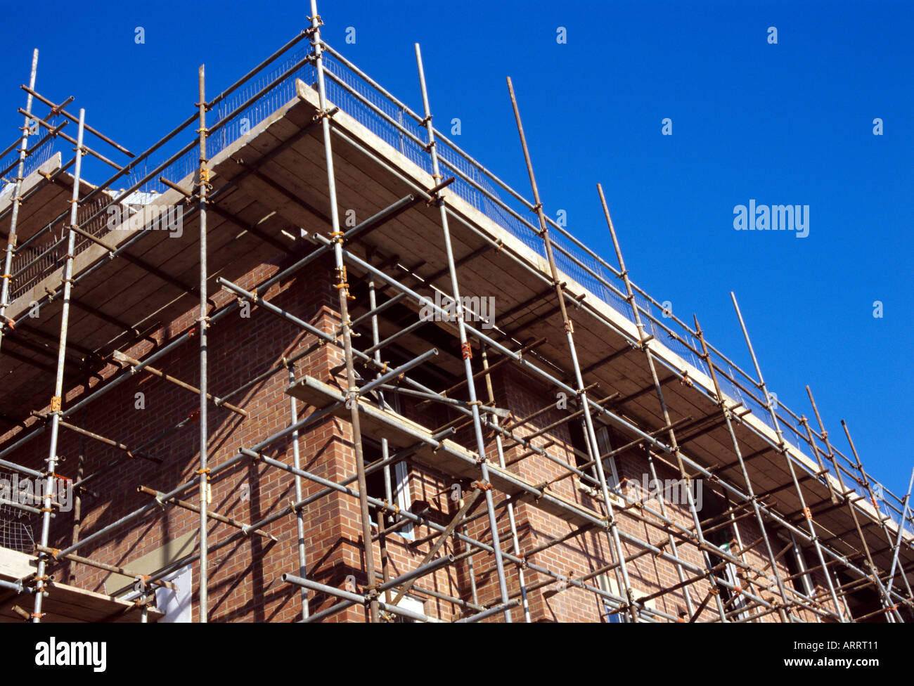 Scaffolding around new Buildings Stock Photo - Alamy