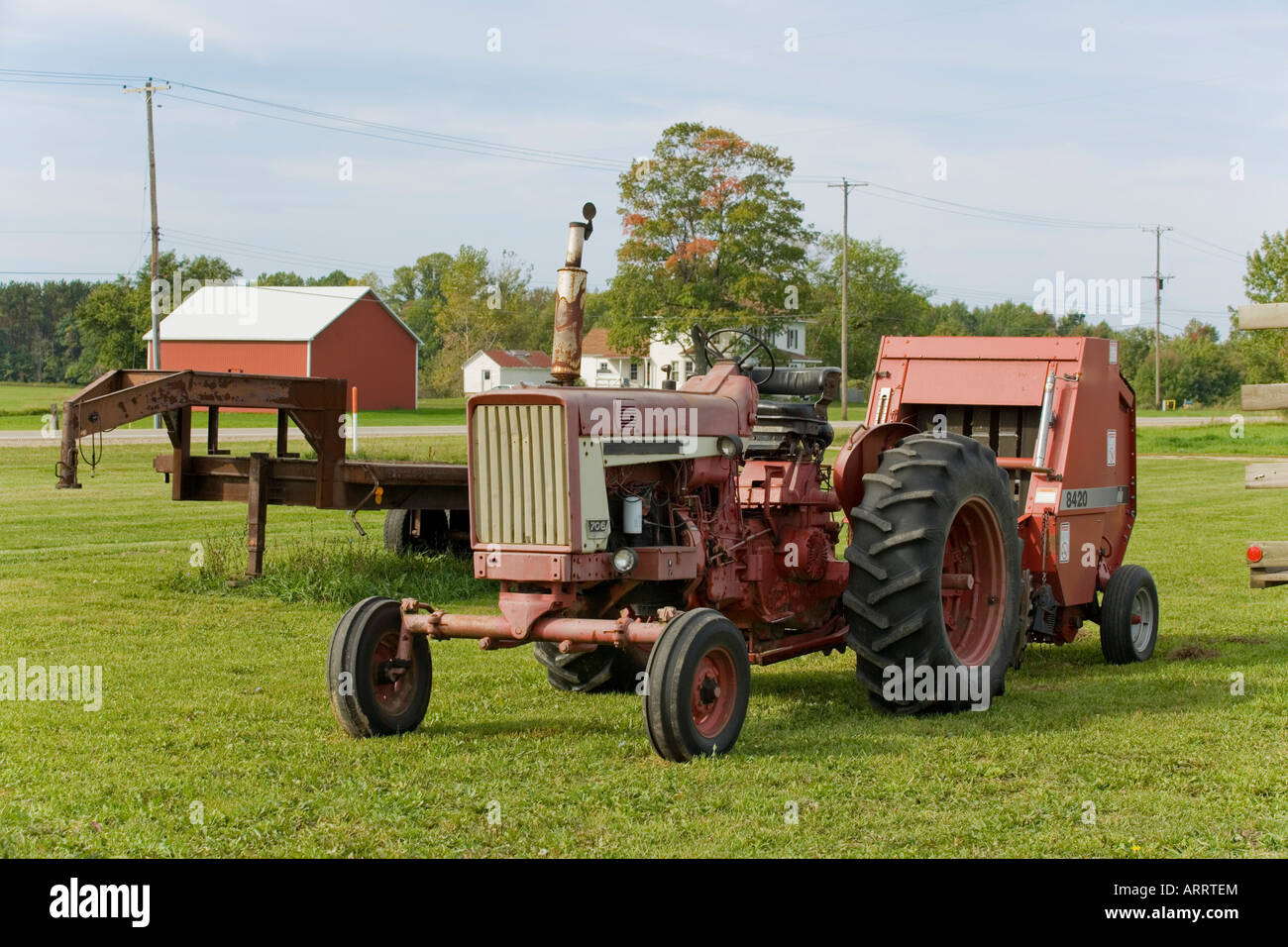 Tractor on farm Stock Photo - Alamy