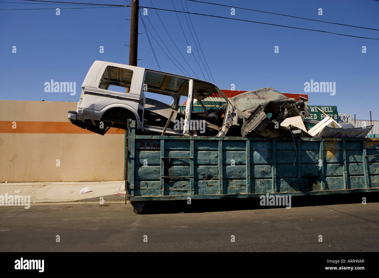 Car frames and parts in dumpster Stock Photo - Alamy
