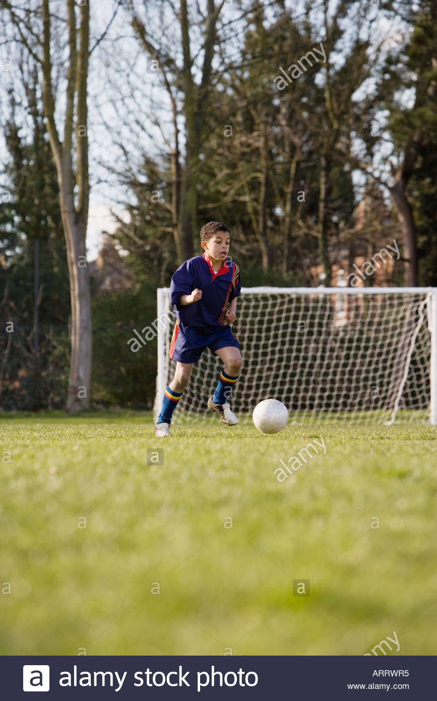 Footballer Kicking Ball Stock Photos & Footballer Kicking Ball Stock ...