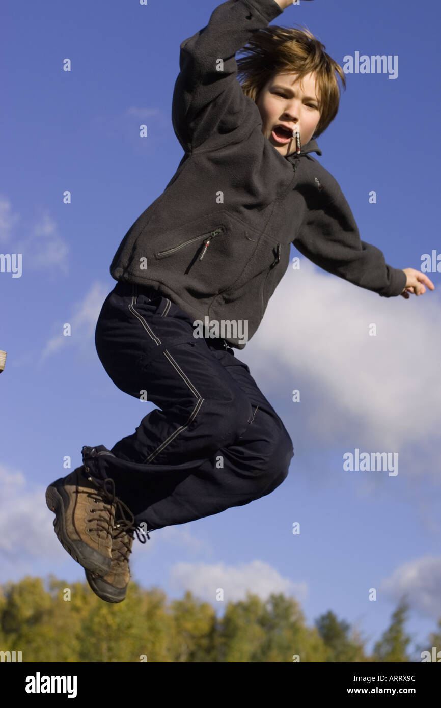 boy jumping Stock Photo - Alamy