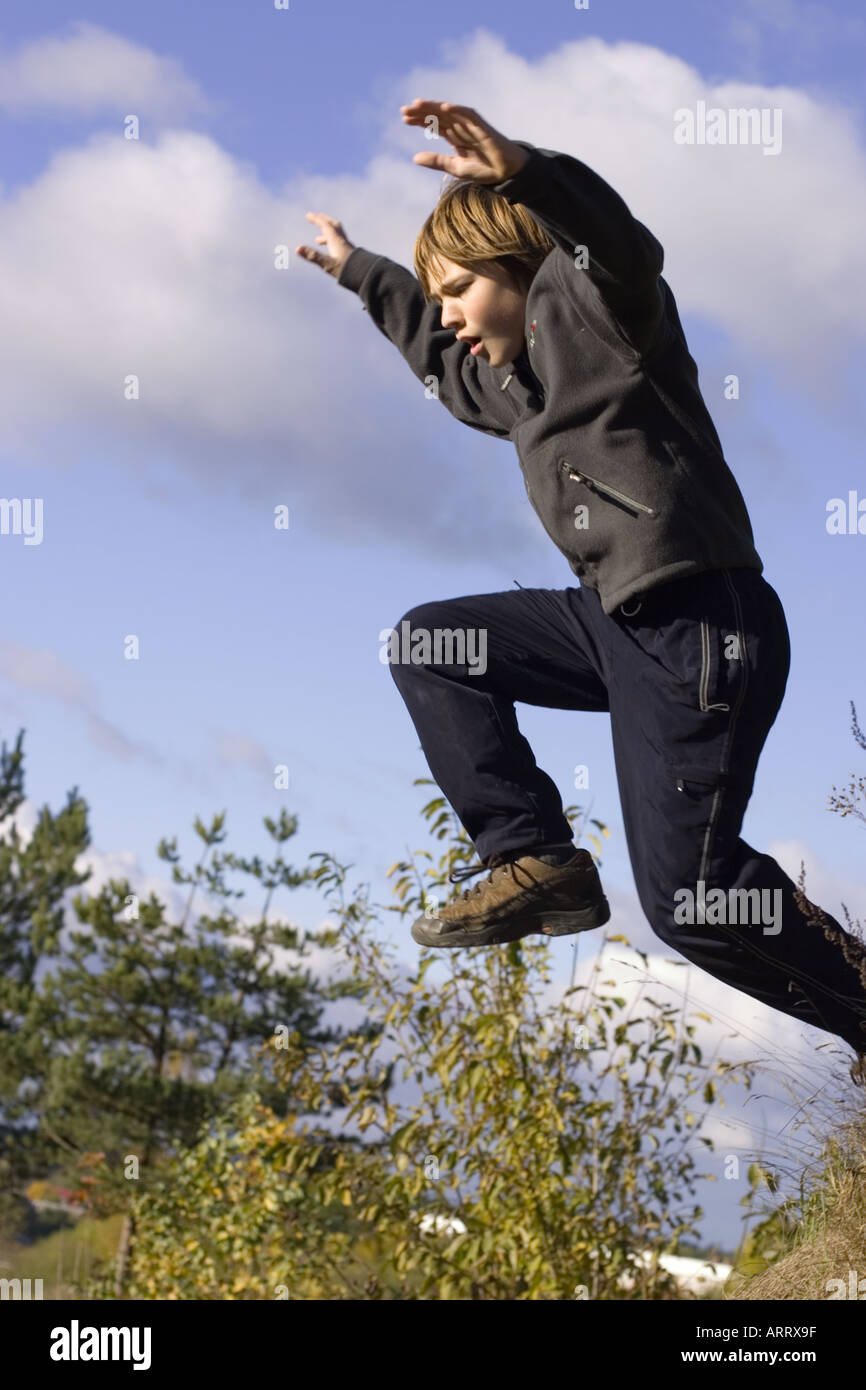 boy jumping Stock Photo - Alamy