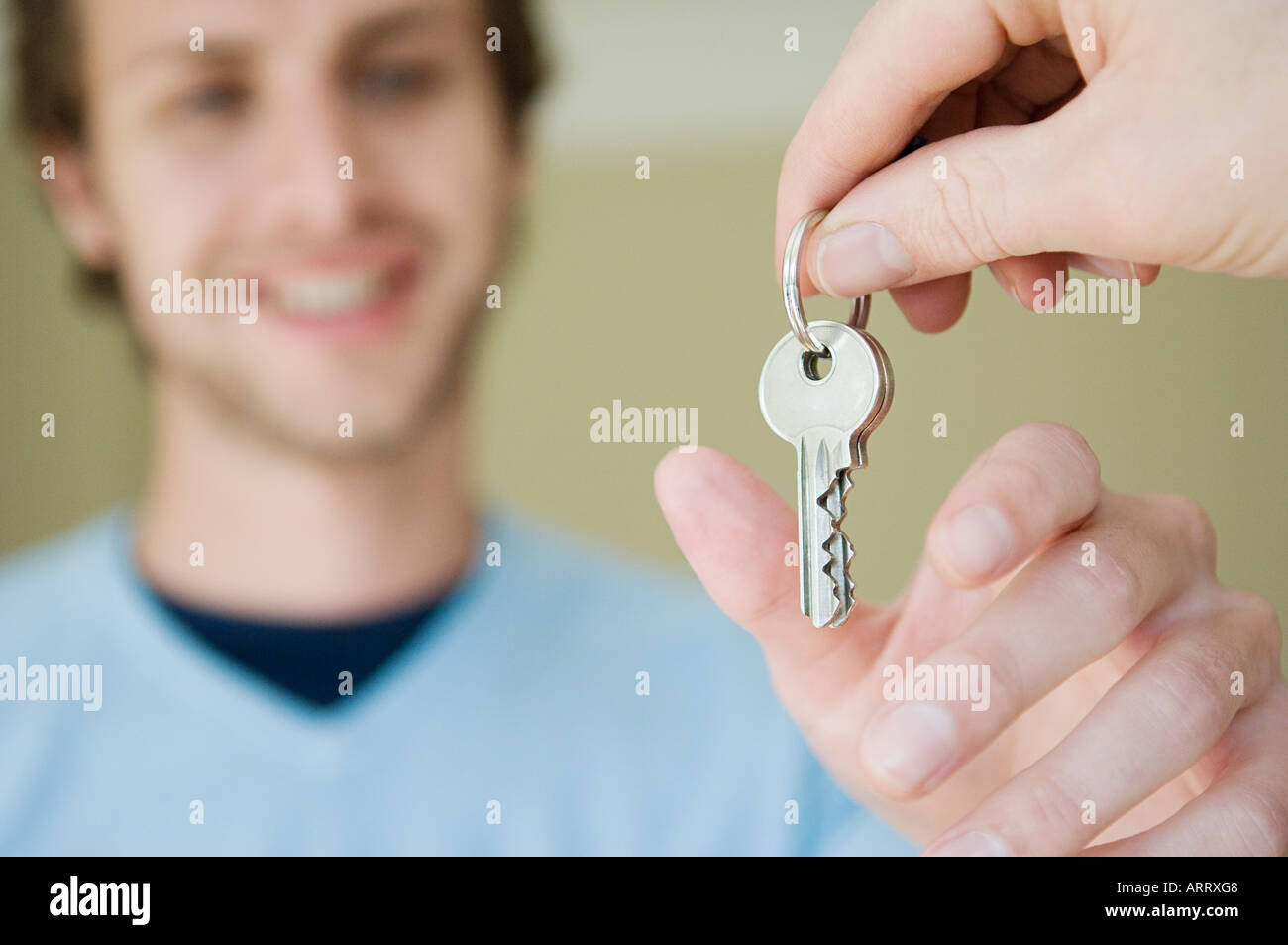 Man taking keys Stock Photo - Alamy