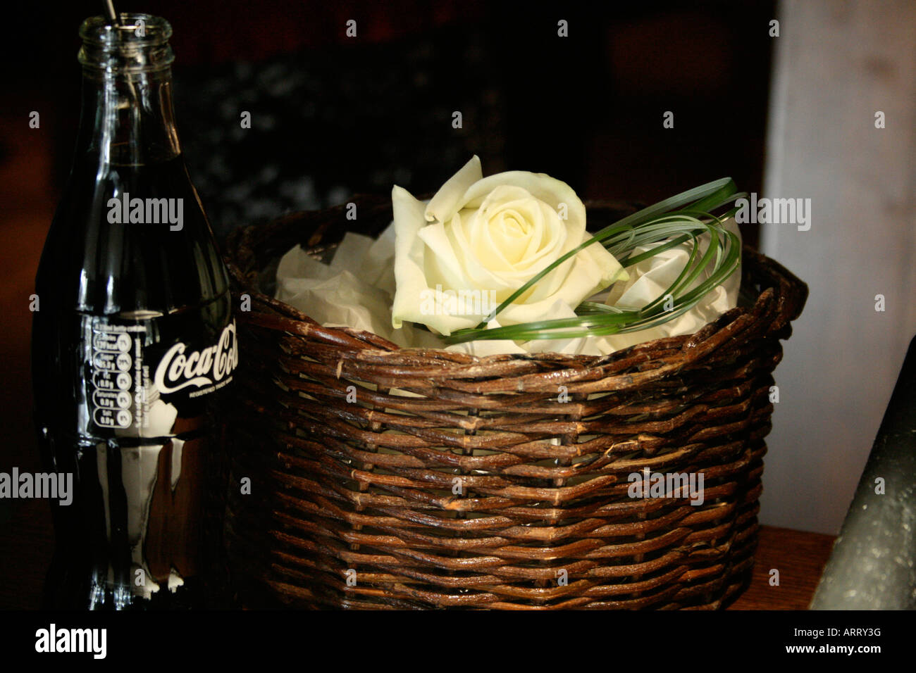Rose and botle of coca-cola Stock Photo - Alamy