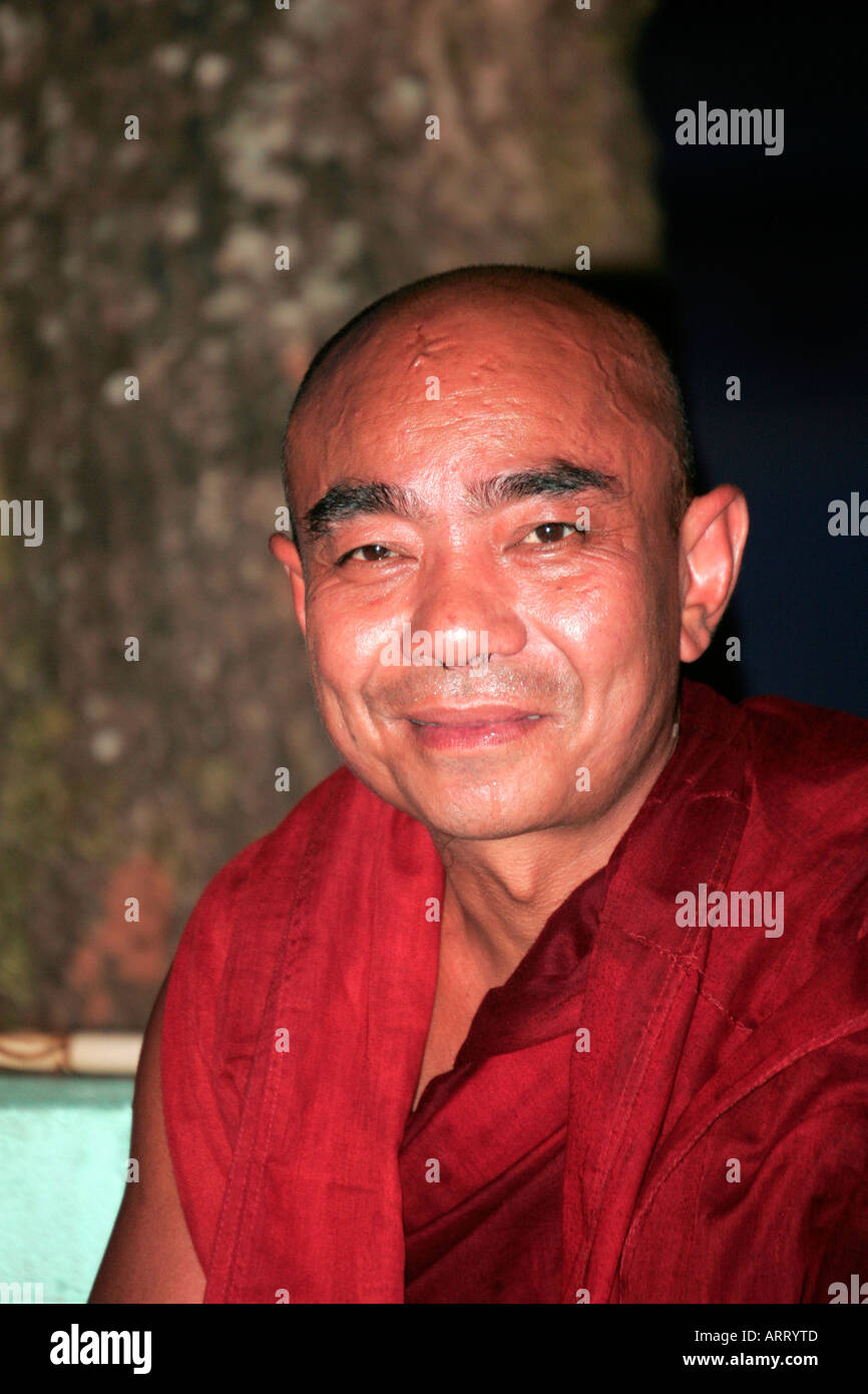 Buddhist monk at night at the Golden Rock at Kyaiktiyo, Lower Burma ...
