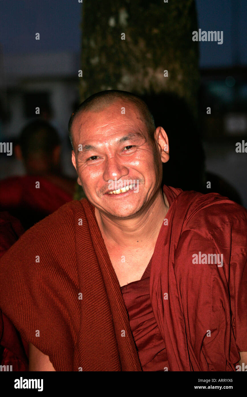 Buddhist monk at night at the Golden Rock at Kyaiktiyo, Lower Burma ...