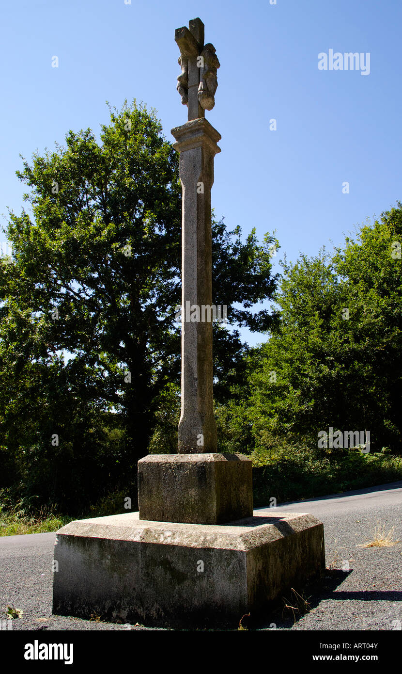 stone cross on a platform with steps and sculpted the crucifix that is ...