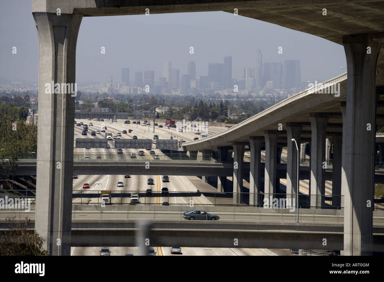 View of freeway traffic and downtown Los Angeles from elevated train ...