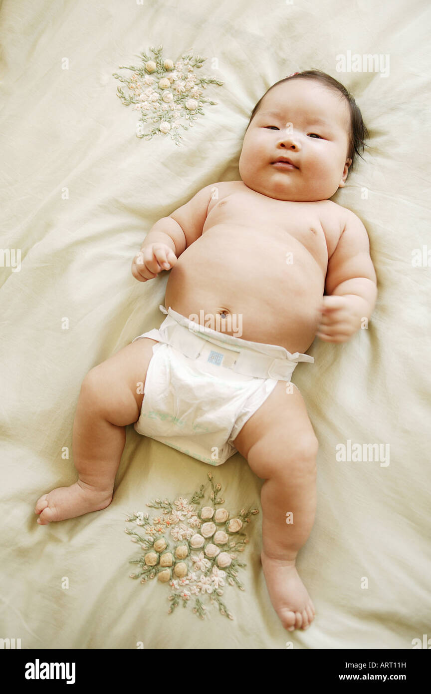 Baby in Diapers Stock Photo - Alamy