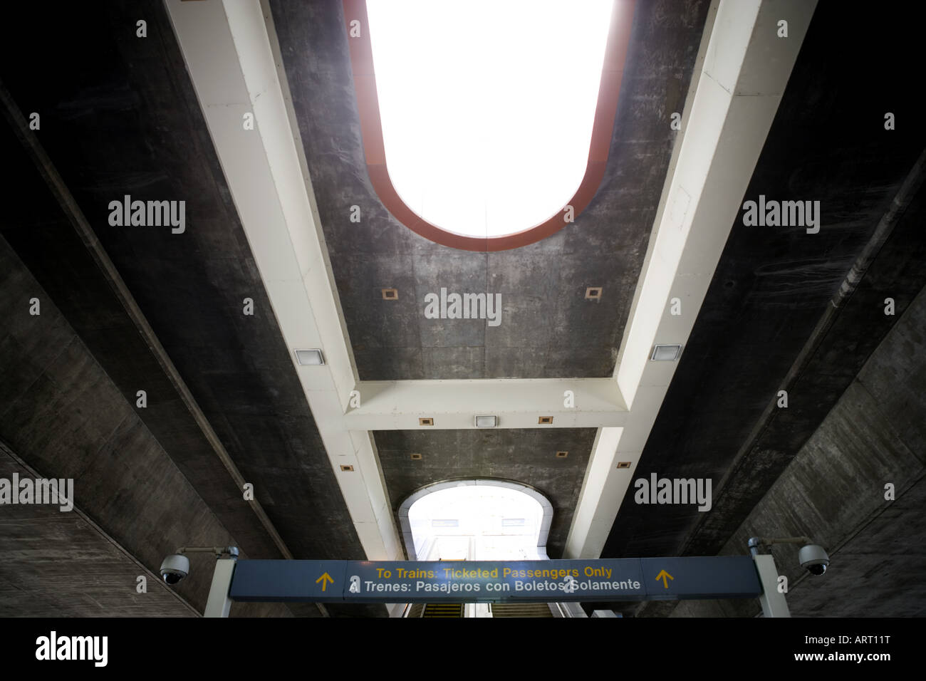 Overhead sign in lower level of train station Stock Photo - Alamy