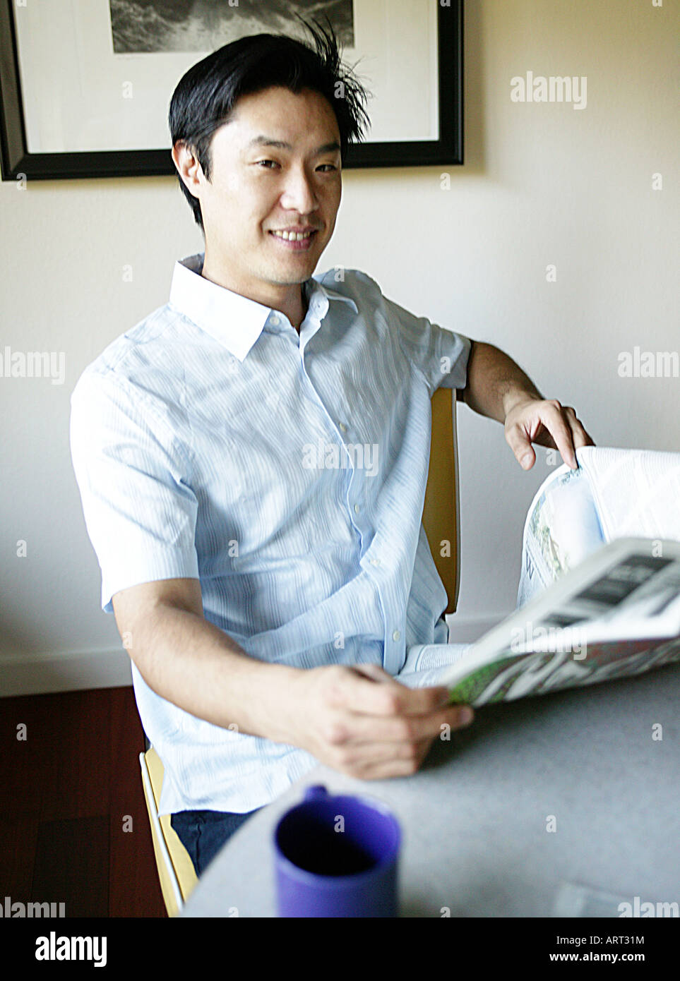 Man with Newspaper Stock Photo - Alamy