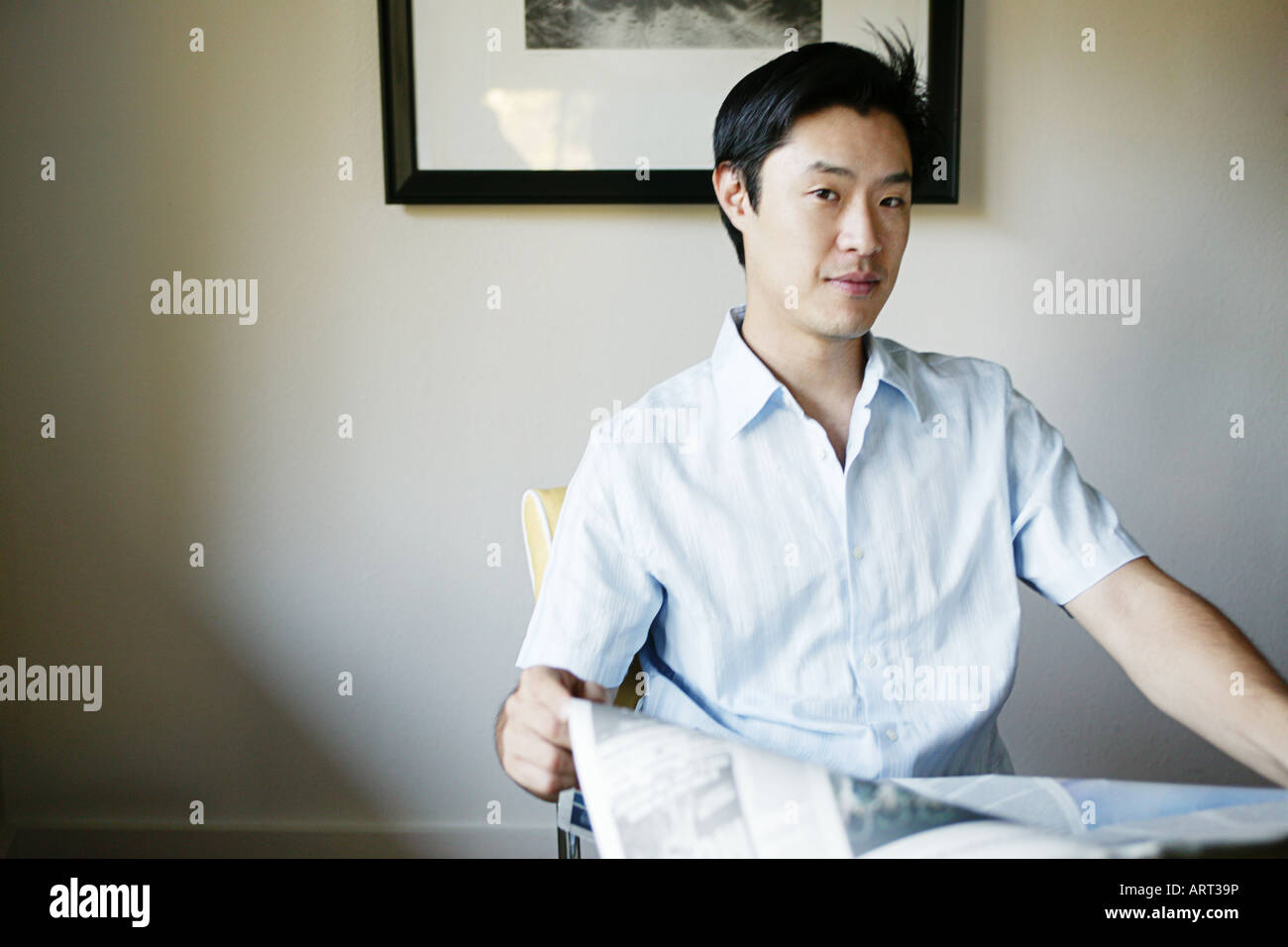 Man with Newspaper Stock Photo - Alamy